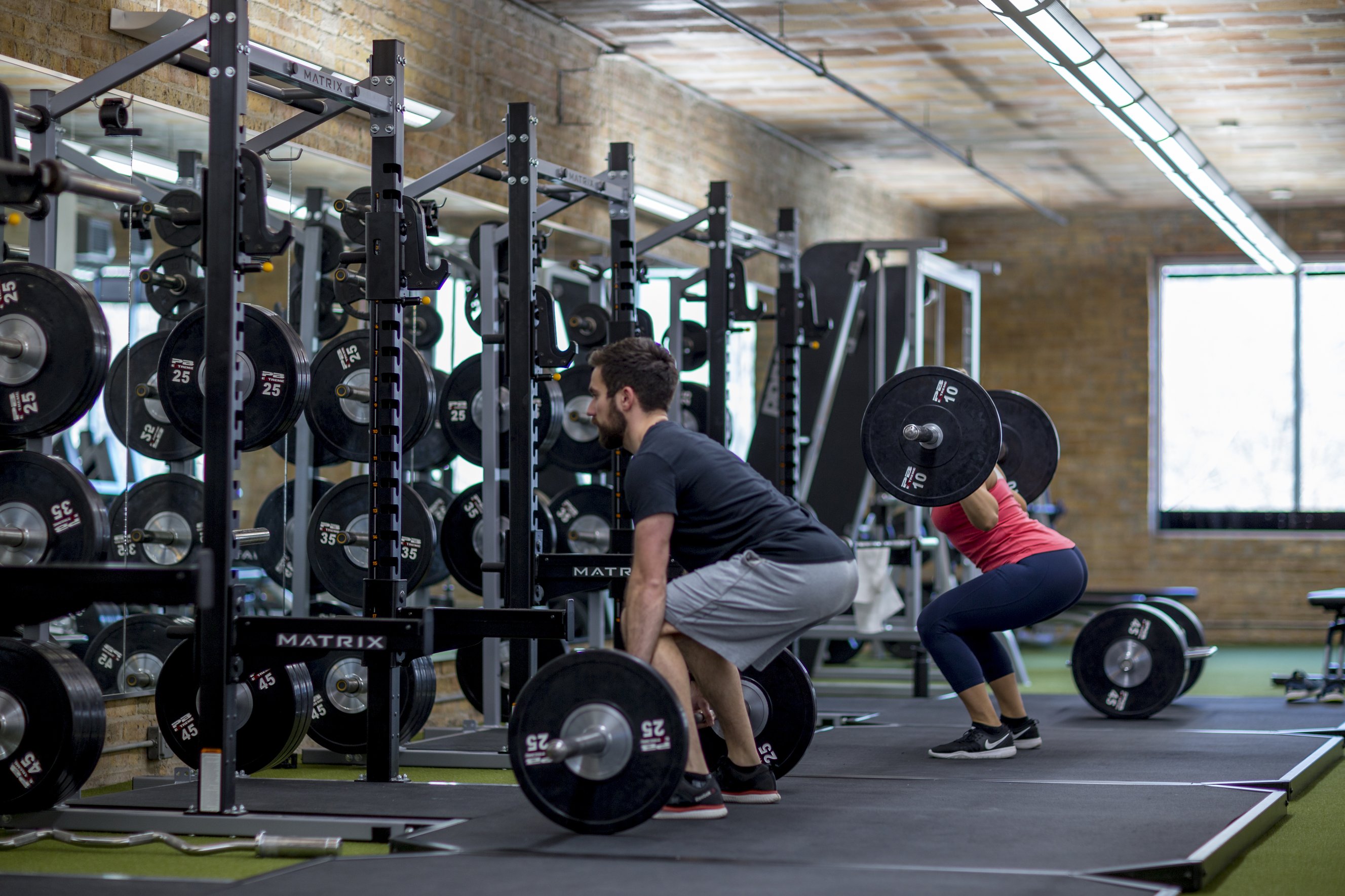 10 Essential Squat Rack Exercises for Muscle Building